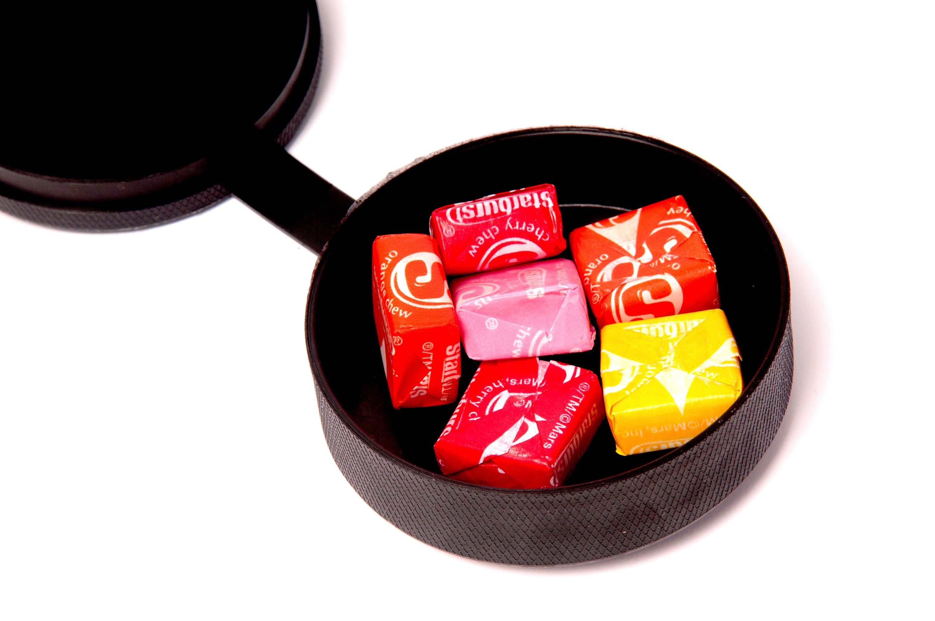 The Party Puck is a container that looks like a hockey puck.